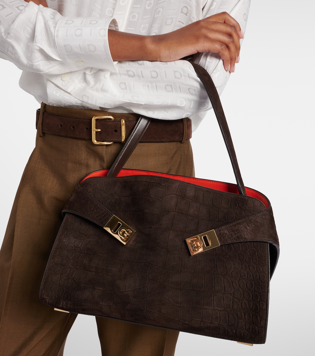 Hug Small suede shoulder bag in brown - Ferragamo | Mytheresa