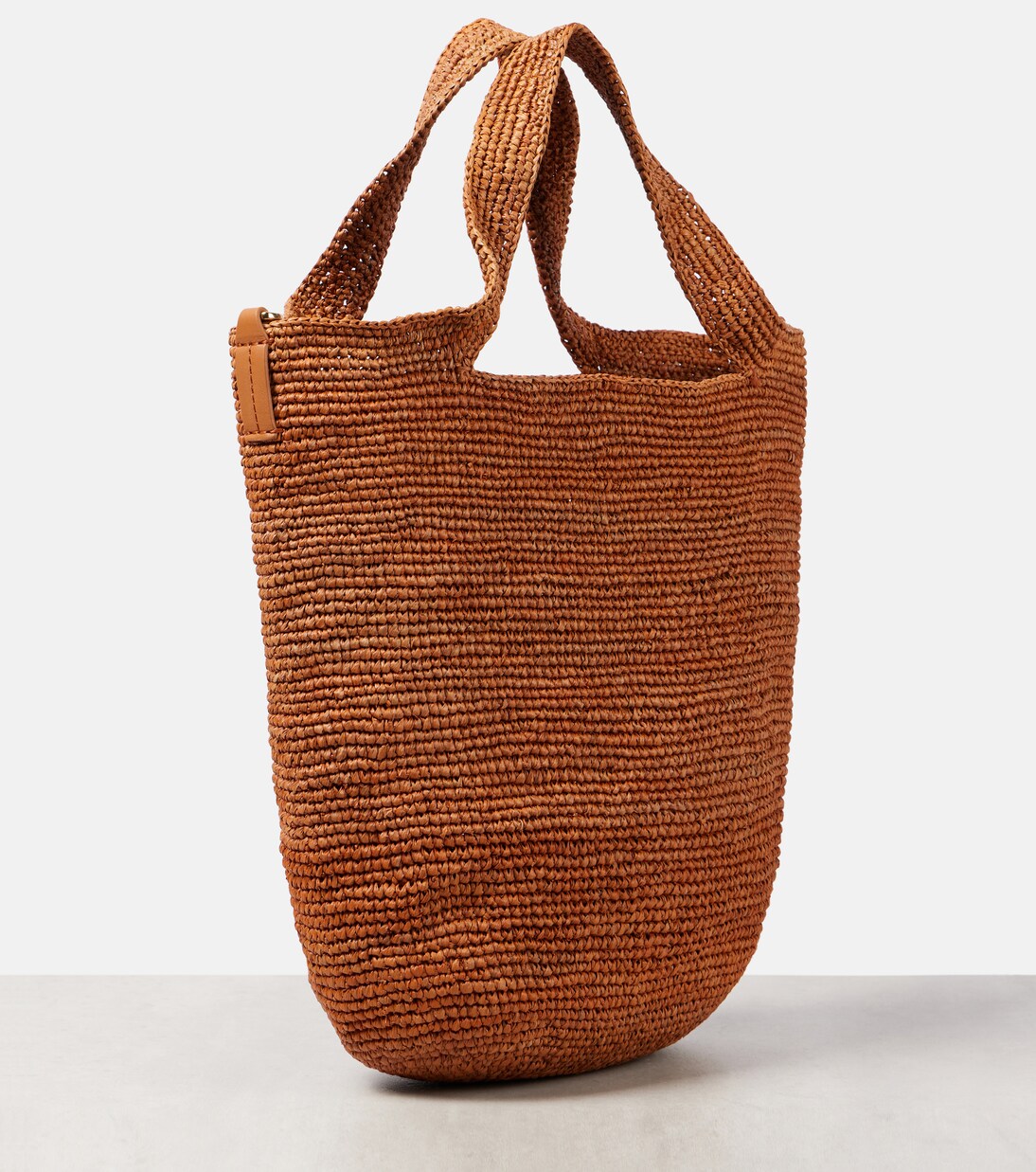 Slit Mini raffia tote bag in brown - Loewe | Mytheresa