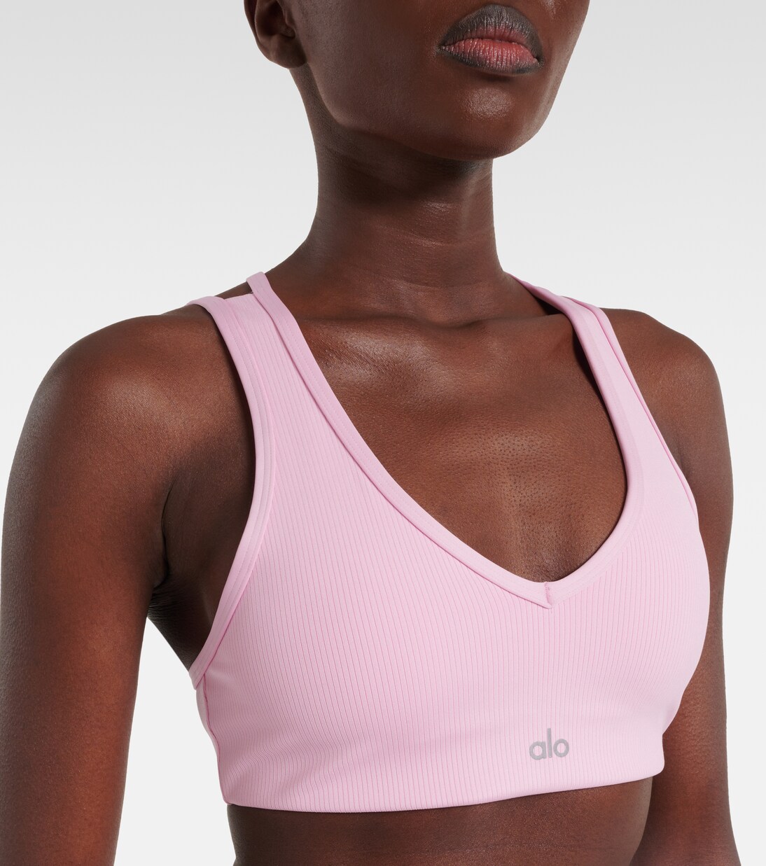 Airlift Jump Start ribbed-knit sports bra in pink - Alo Yoga | Mytheresa