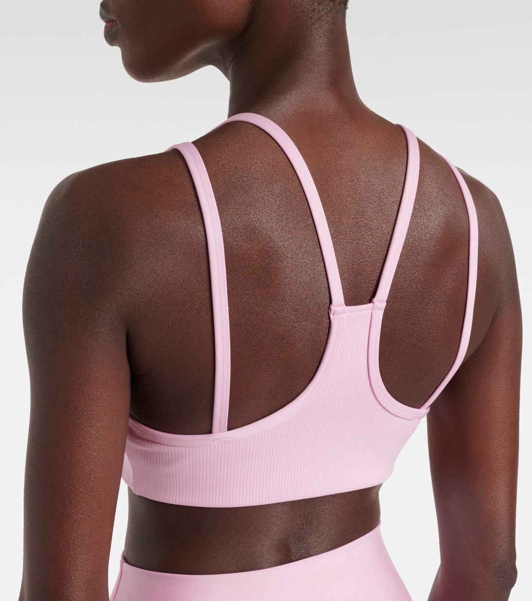 Airlift Jump Start ribbed-knit sports bra in pink - Alo Yoga | Mytheresa