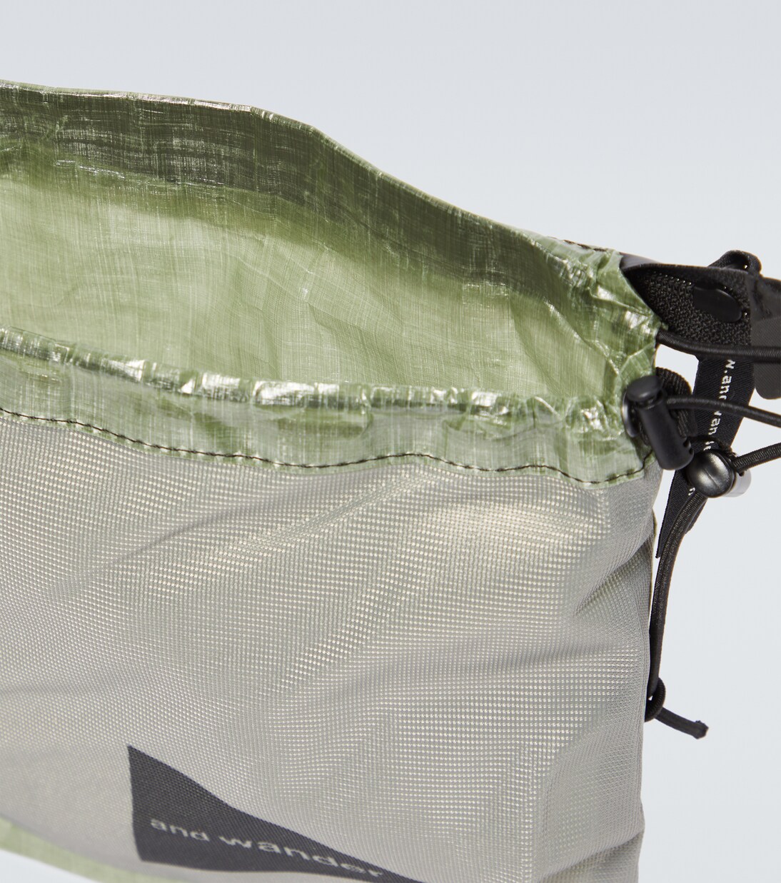 Sacoche Dyneema® crossbody bag in green - And Wander | Mytheresa