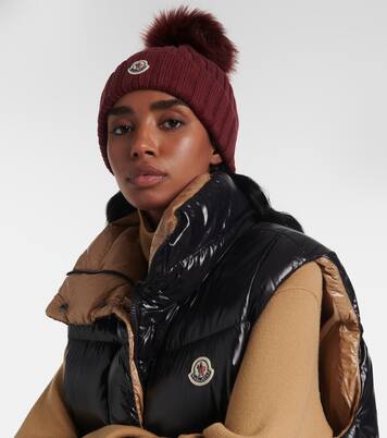 Logo faux fur trimmed wool beanie in red Moncler Mytheresa
