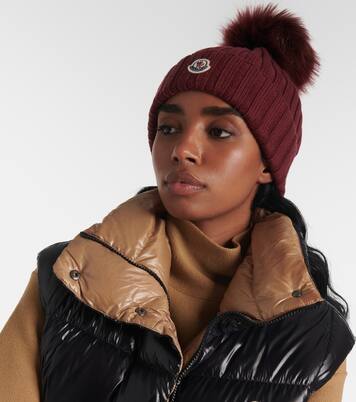 Logo faux fur trimmed wool beanie in red Moncler Mytheresa